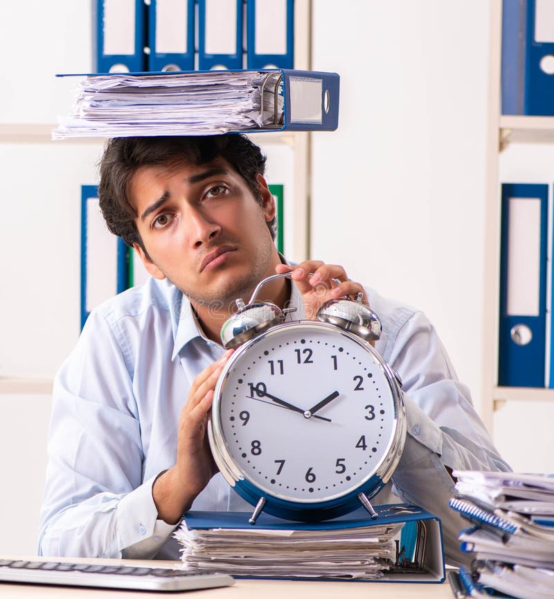 Overloaded Busy Employee with Too Much Work and Paperwork Stock Photo ...