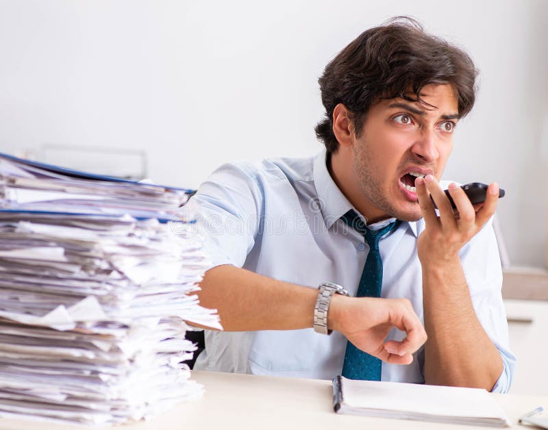 Overloaded Busy Employee with Too Much Work and Paperwork Stock Photo ...