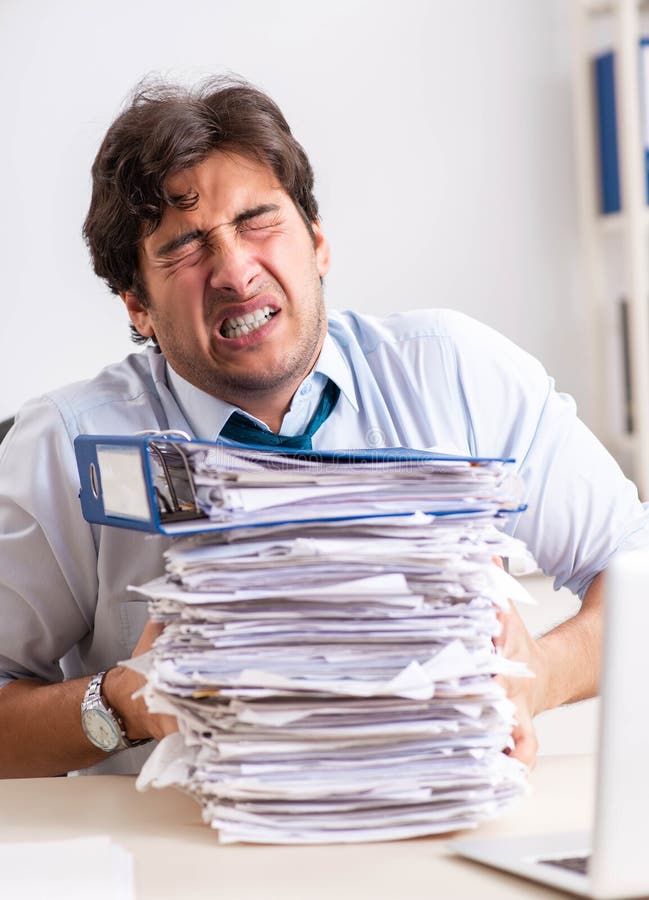 Overloaded Busy Employee with Too Much Work and Paperwork Stock Image ...