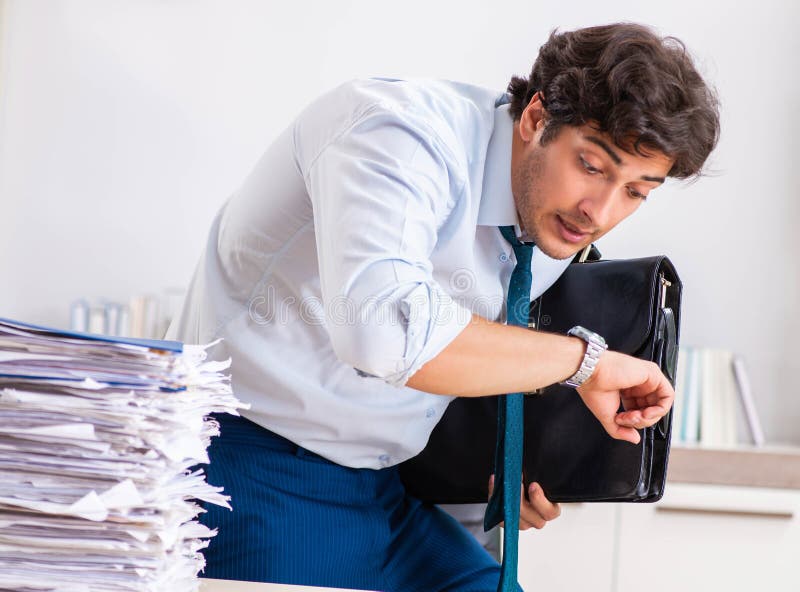 Overloaded Busy Employee with Too Much Work and Paperwork Stock Photo ...