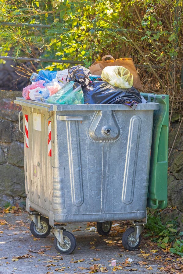 Overloaded Wheeled Trash stock photo. Image of exterior - 245367498