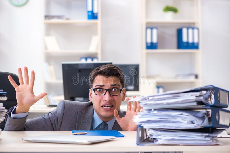 Overloaded with Work Employee Under Paperwork Burden Stock Photo ...
