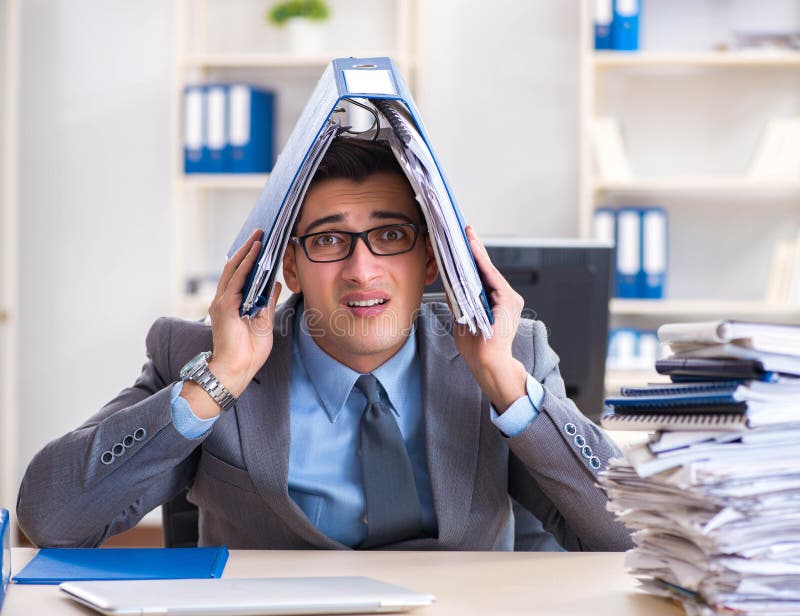 Overloaded with Work Employee Under Paperwork Burden Stock Photo ...