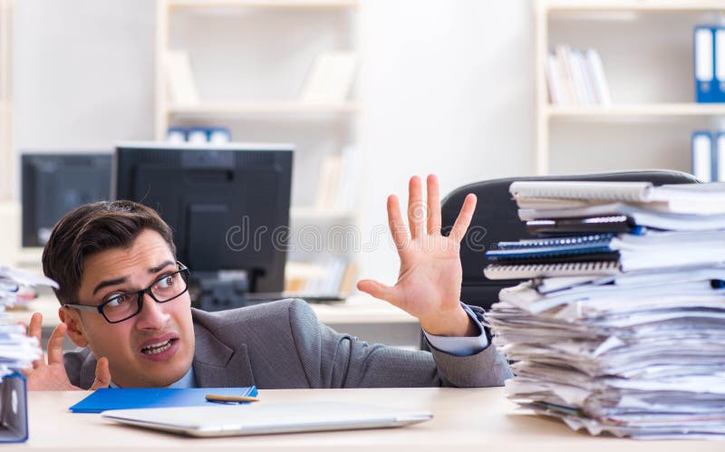 Overloaded with Work Employee Under Paperwork Burden Stock Photo ...