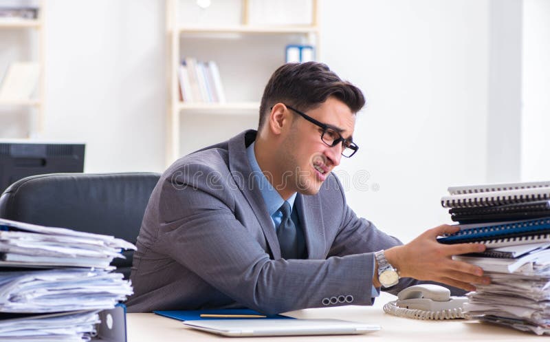 Overloaded with Work Employee Under Paperwork Burden Stock Photo ...