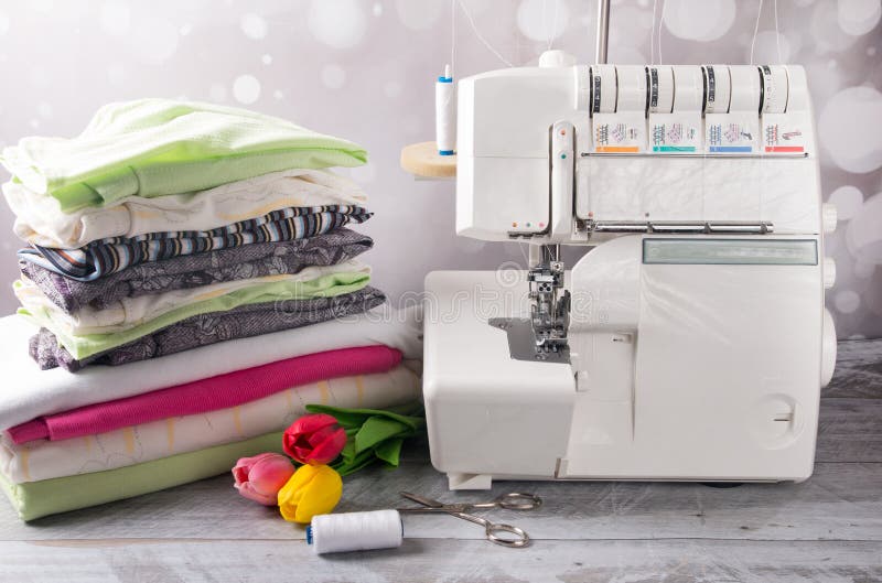 Overlock Sewing Machine and Fabric Stack. Stock Photo - Image of ...