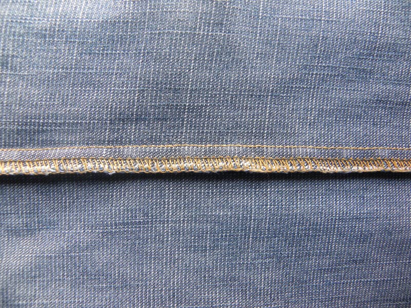 Overlock Stitch on Blue Jeans Stock Image - Image of detail, cloth ...