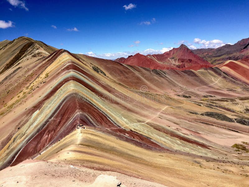 Overlooking the Multi-colored Rainbow Mountain while Hiking in T Stock ...