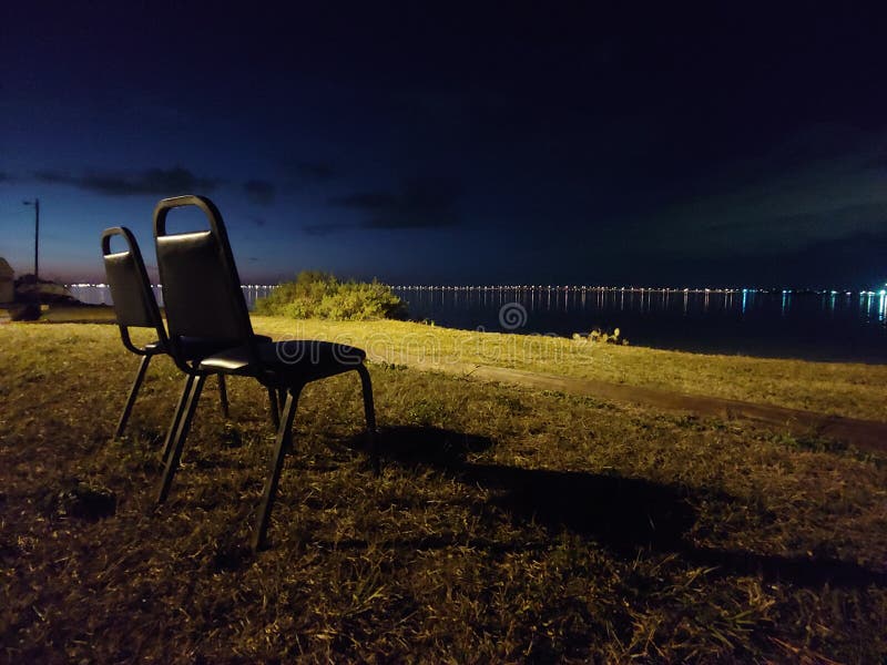 Overlooking the Water at Night Stock Photo - Image of water ...