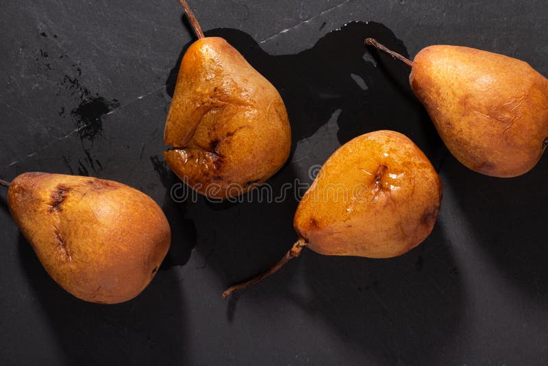 Overripe Pears with Black Background and Warm Lighting. Stock Image ...