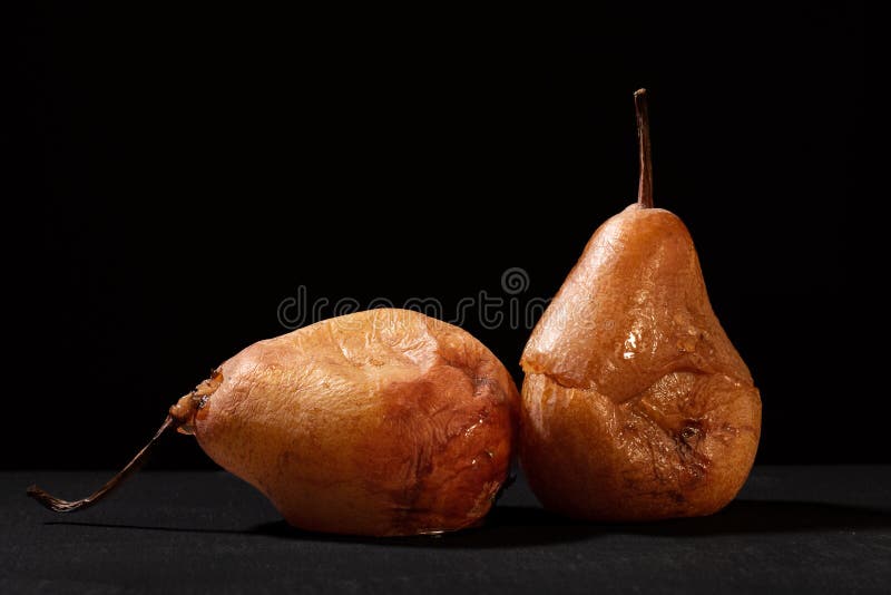 Overripe Pears with Black Background and Warm Lighting. Stock Image ...