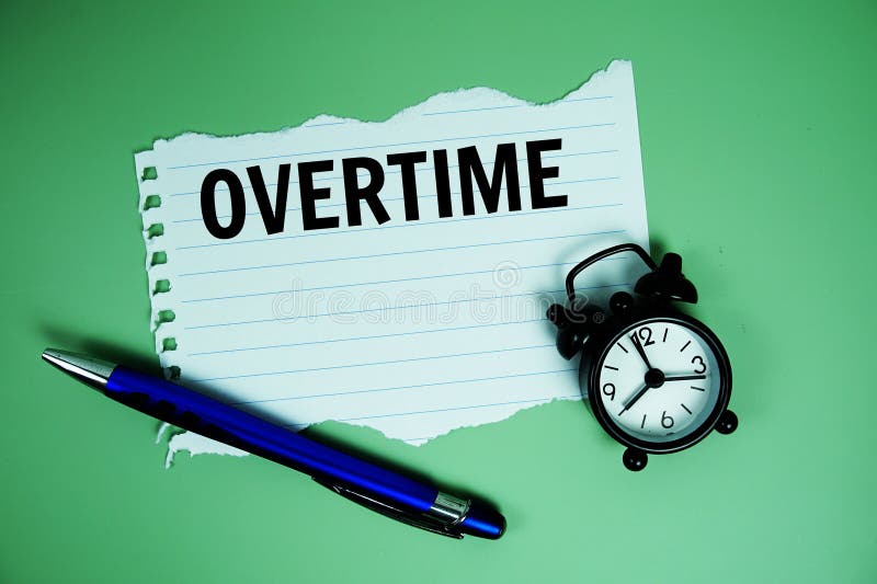 Overtime Text on Paper Torn with Alarm Clock Top View on Green ...