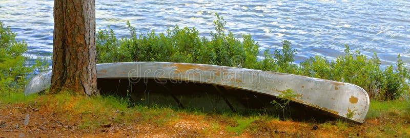 Overturned Canoe stock image. Image of tree, outdoors - 60109553