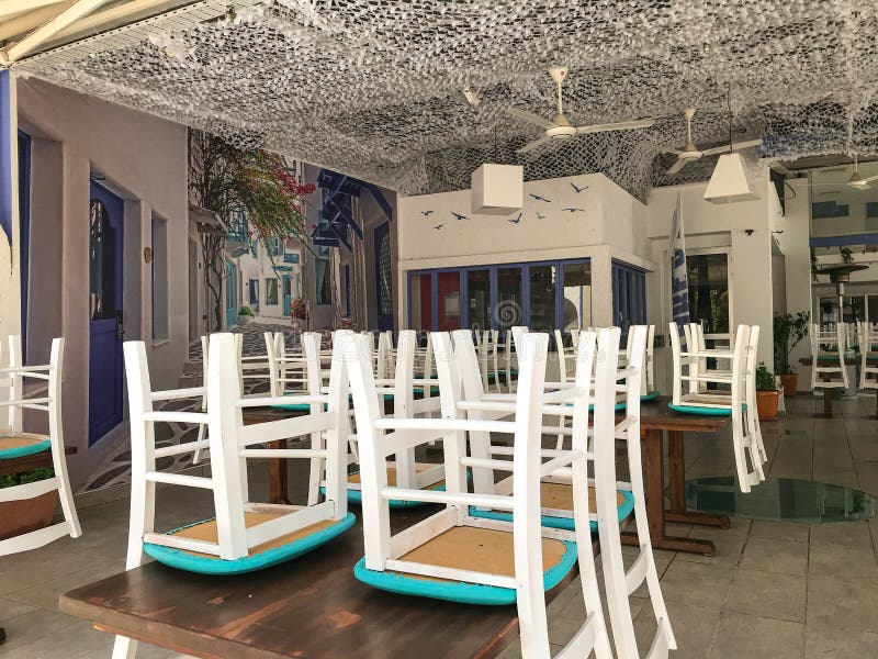 Overturned Chairs on a Table in an Empty Cafe. Lockdown 2021. Pandemic ...
