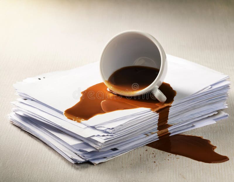 Overturned Coffee Cup Spilling Onto Important Documents As a Symbol of ...