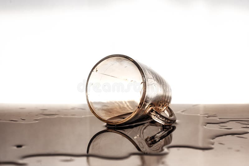 Overturned cup splashing stock photo. Image of reflection - 158862804