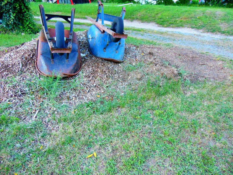Overturned wheelbarrows stock image. Image of driveway - 95119785