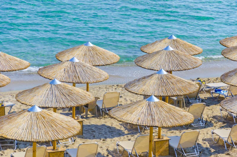Overview of the Beach with Straw Umbrella Stock Image - Image of ...