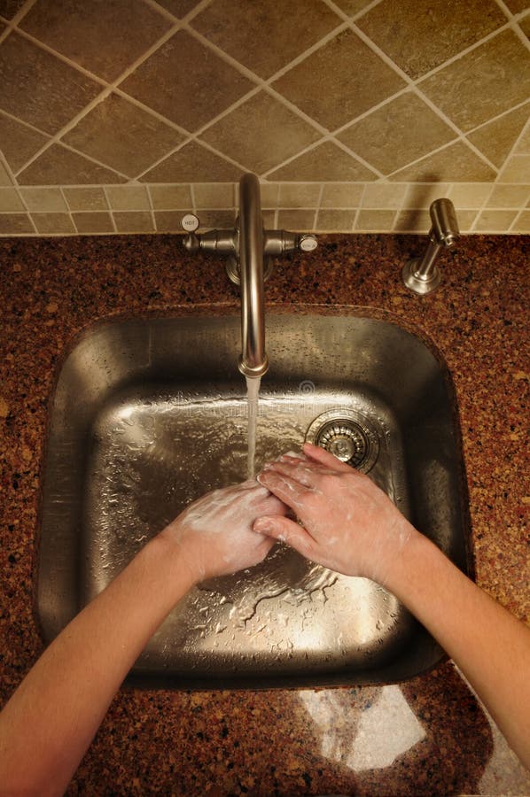 Overview of Hand Washing Over a Steel Sink Stock Photo - Image of ...