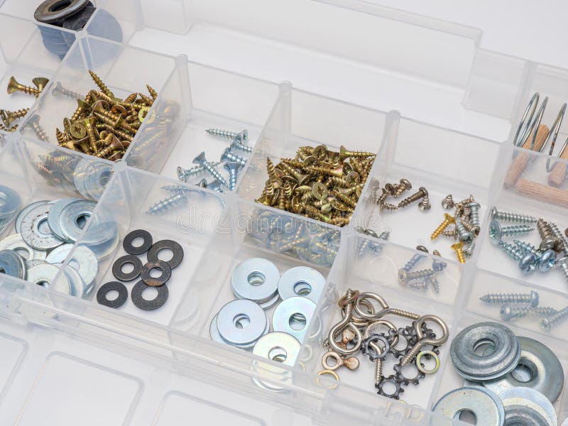 Overview of a Plastic Organizer with Small Screws and Shimps Stock ...