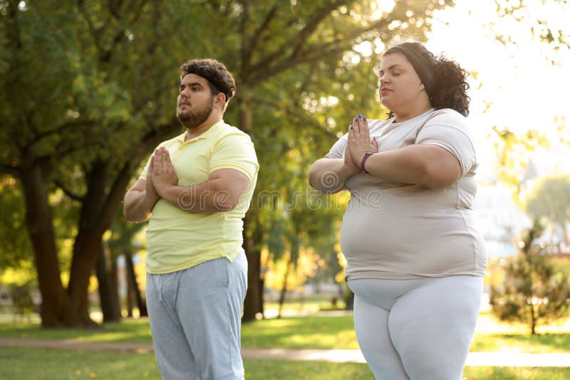 Overweight Couple Training Together in Park Stock Image - Image of ...