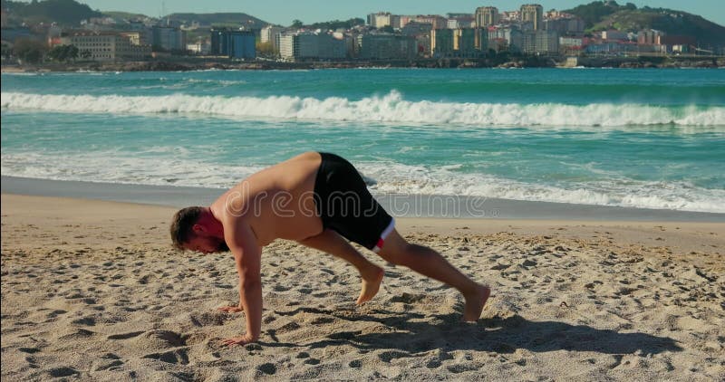 An Overweight Man Does Exercises on the Beach. Stock Video - Video of ...