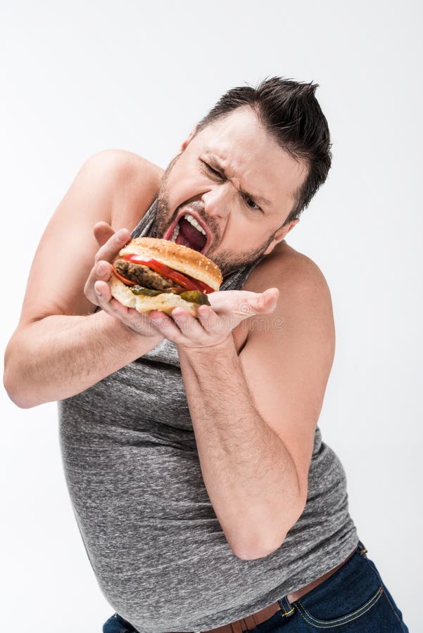 Man Making Face Expression while Posing with Burger Isolated on White ...