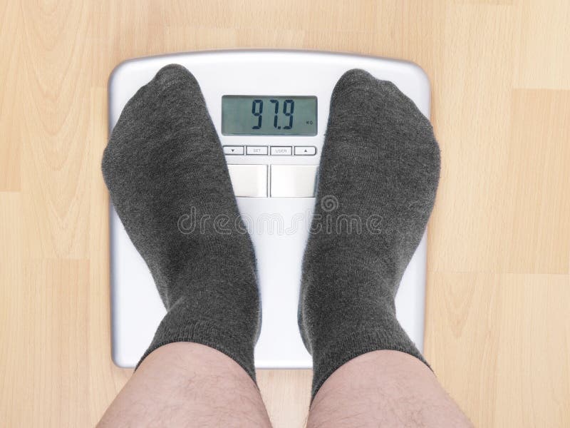 Overweight man on scales stock photo. Image of person - 18836212