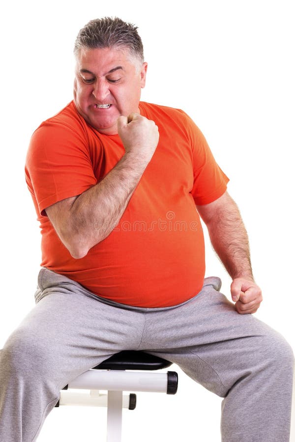 Overweight Man Showing His Strength after Doing Exercises Seted Stock ...