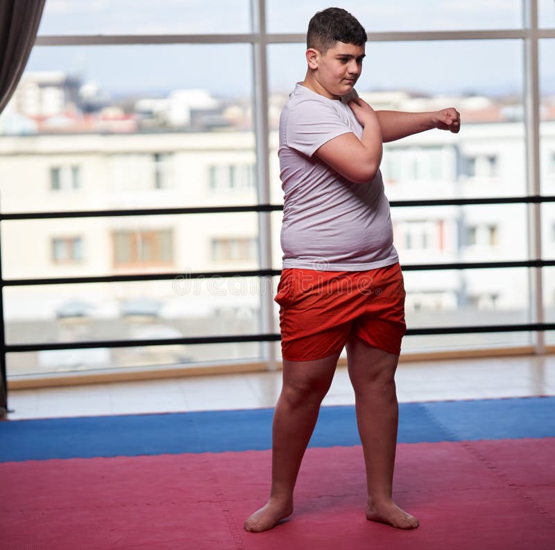 Overweight Man Stretching in the Gym Stock Photo - Image of obese ...