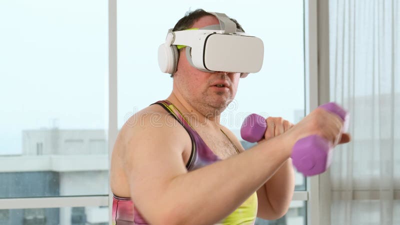 Overweight Sporty Man Doing a Weight Training Exercise by Using ...