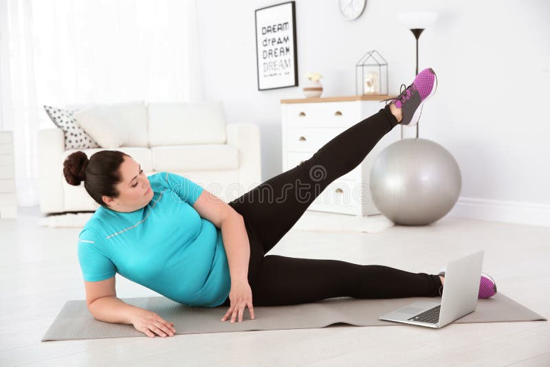 Overweight Woman Doing Exercise Stock Photo - Image of computer, body ...
