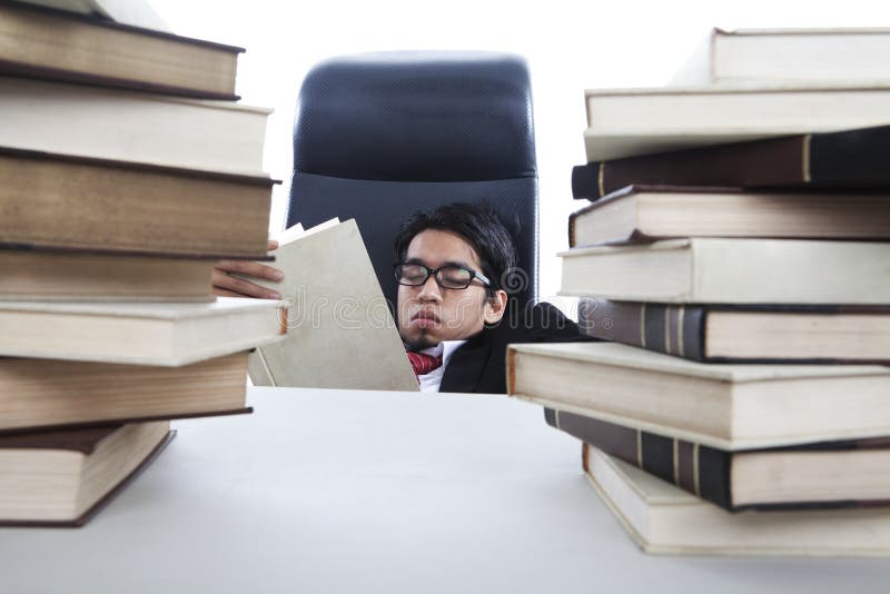 Overwhelmed reading books stock photo. Image of education - 23403276