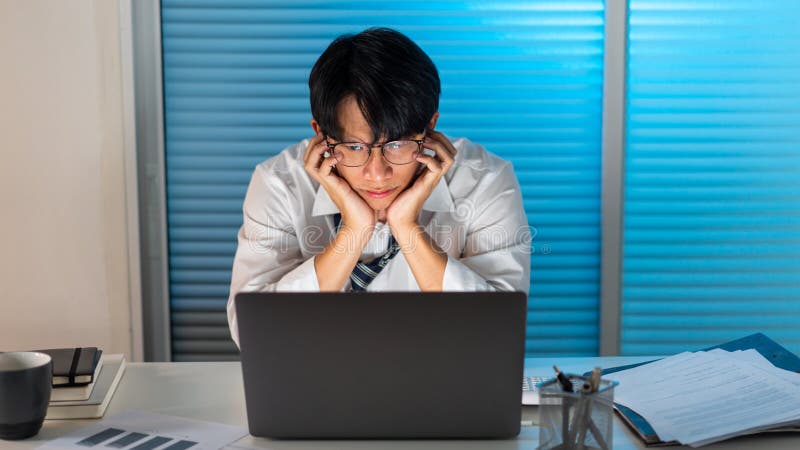 Overwork Concept the Office Personnel in the Loose Tie Sitting at His ...