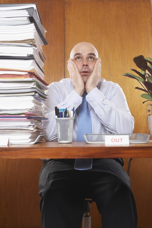 Overworked Businessman at Desk Stock Image - Image of deskwork, holder ...