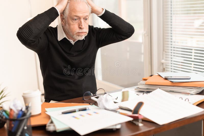 Overworked Businessman Sitting at a Messy Desk Stock Image - Image of ...