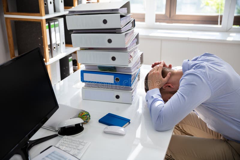 Overworked Businessman stock image. Image of problem - 181423813