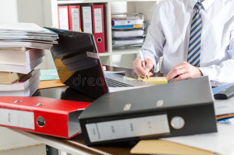 Untidy and cluttered desk stock image. Image of clutter - 56856759