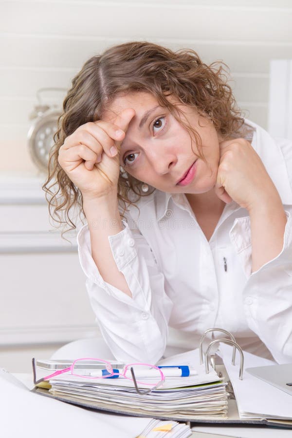 Overworked businesswoman stock photo. Image of tired - 35322352