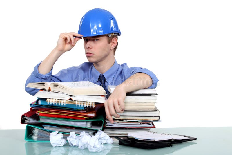 Overworked engineer stock photo. Image of engineer, books - 27192052