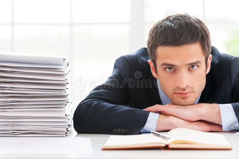 Depressed and overworked. stock image. Image of camera - 41192523