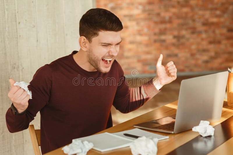 Overworked Guy Shouting Crumpling Paper Sitting at Laptop in Office ...