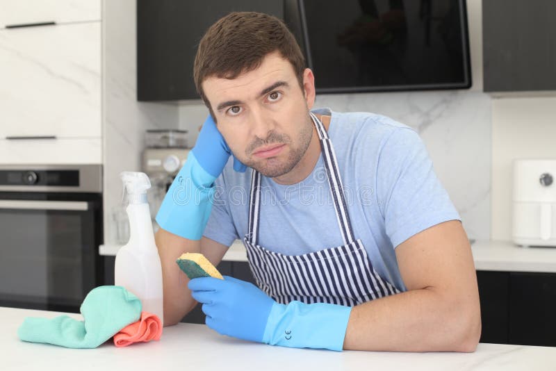 Overworked Looking Man Cleaning the Kitchen Stock Photo - Image of ...