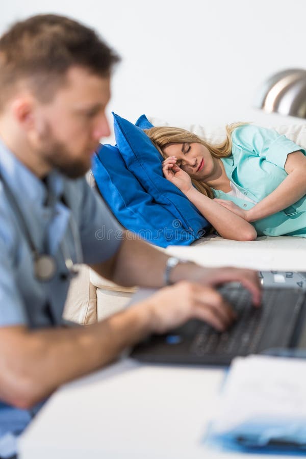 Overworked nurse s sleep stock photo. Image of exhaustion - 55250362