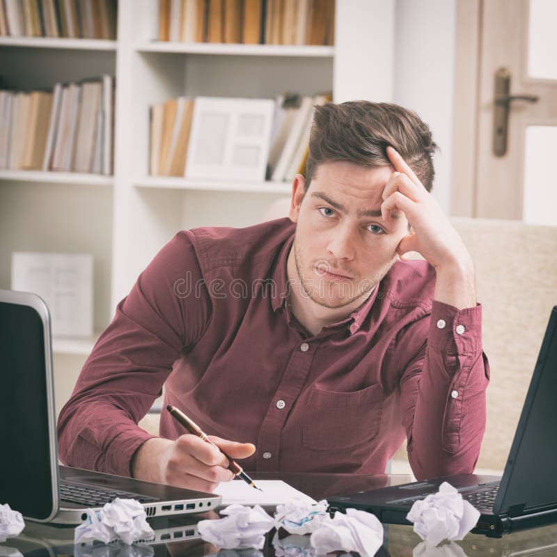 Overworked young man stock photo. Image of business, exhausted - 68061660