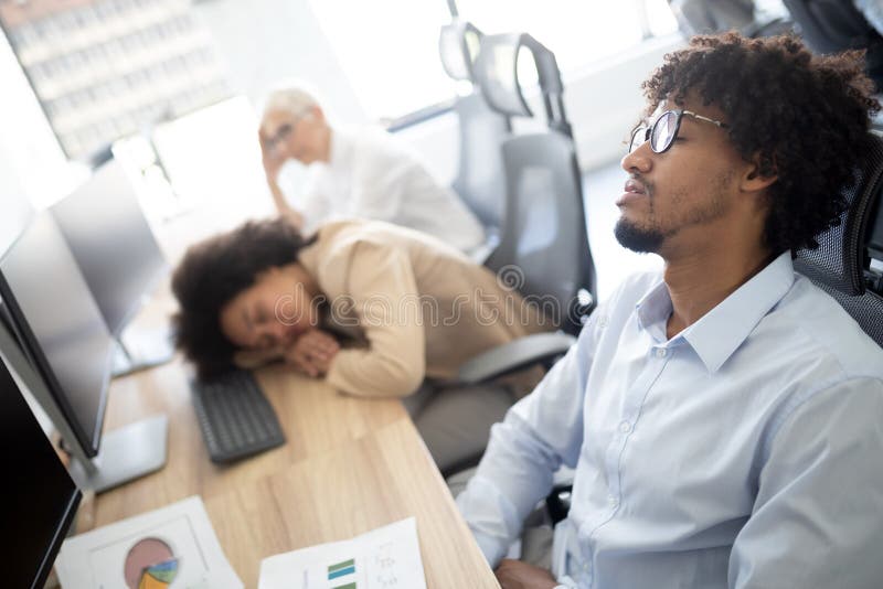 Overworking Concept. Group of Business People Exhausted in Office Stock ...