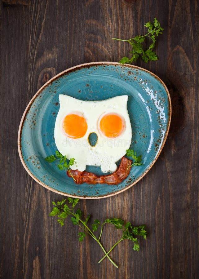 Owl-shaped fried eggs stock photo. Image of portion, cooked - 65869558