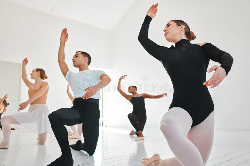 Own the Room. a Group of Young Ballet Dancers Practicing Their Routine in a Dance Studio. Stock ...