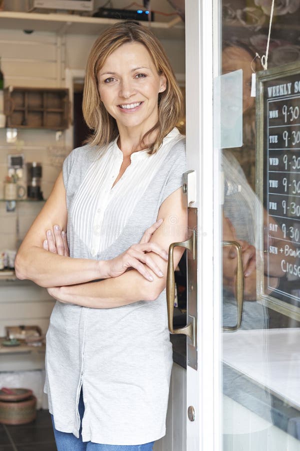 Owner of Gift Shop Standing in Doorway Stock Photo - Image of retail ...