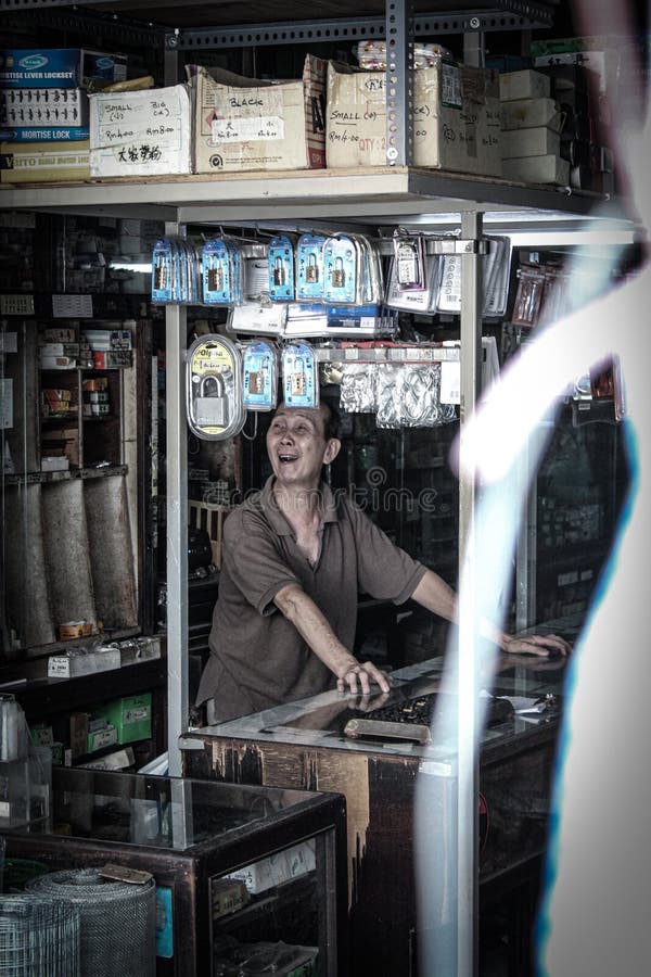 Owner of the old shop editorial photography. Image of shop - 151188532